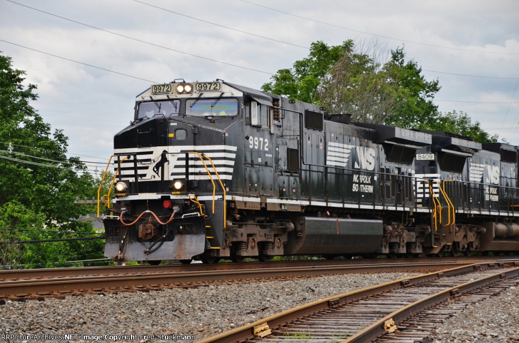NS 9972 fronts empty coal cars.